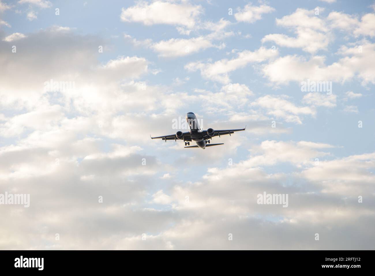plane flying in the sky with clouds in Rio de Janeiro, brazil Stock ...