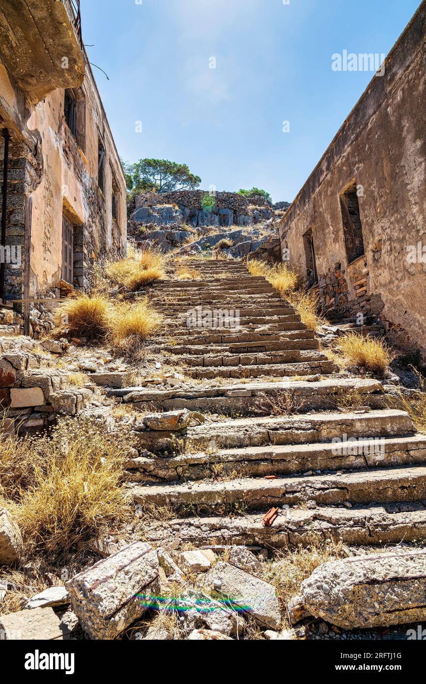 Stairs and buildings in the Spinalonga island of Crete in Greece. Here ...