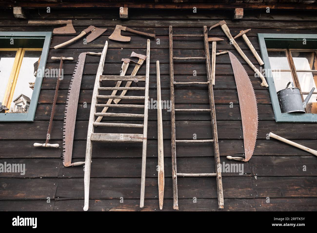 The original decoration of a wooden house with antique household ...