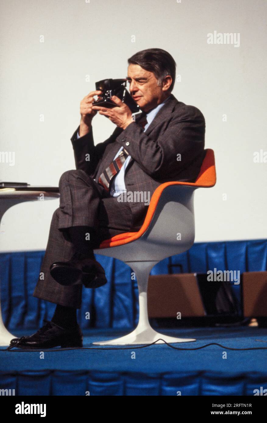 Edwin H. Land - inventor of the Polaroid Land camera - takes a photo ...