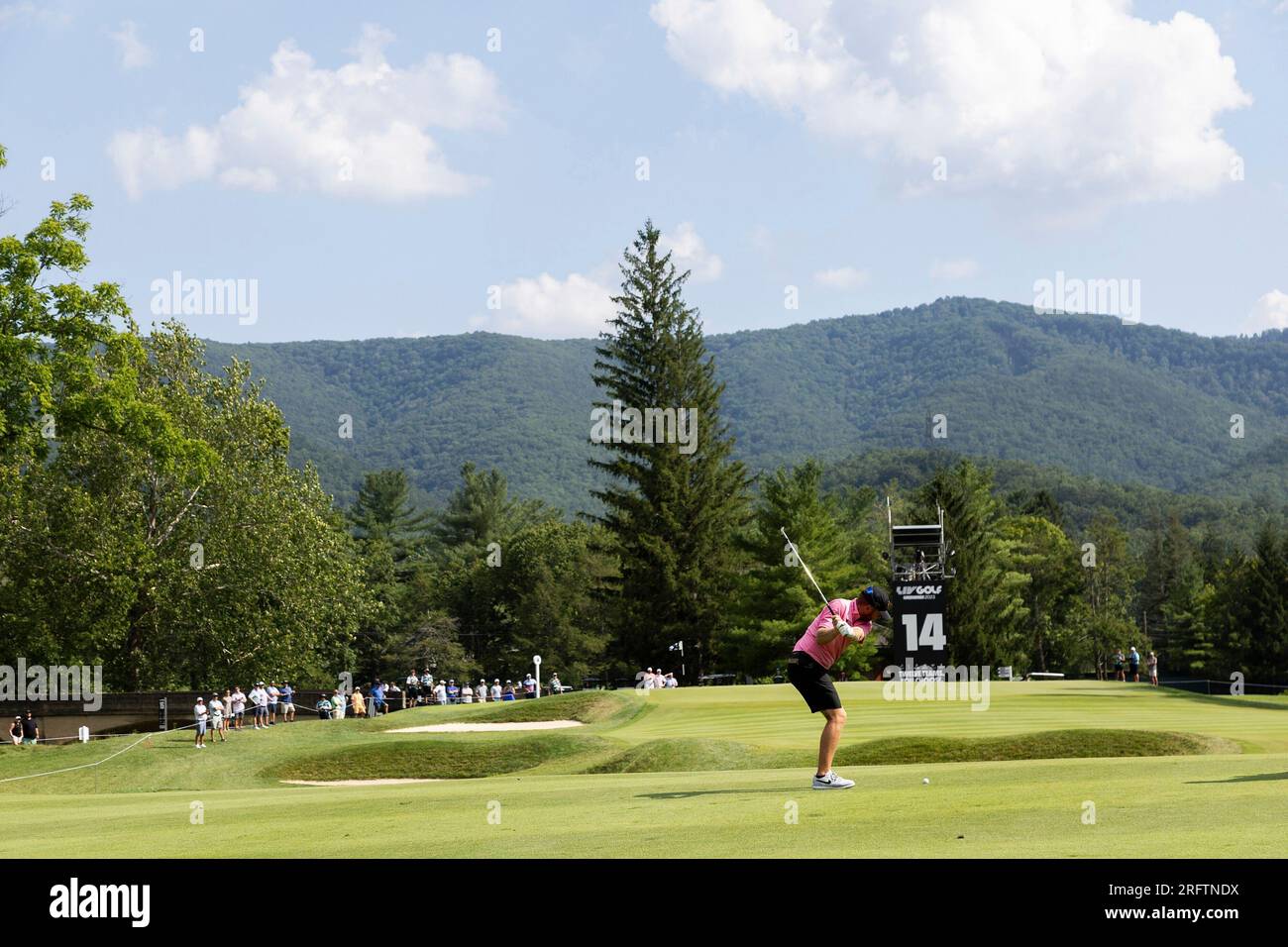 Talor Gooch of RangeGoats GC hits his shot from the fairway on the 14th ...