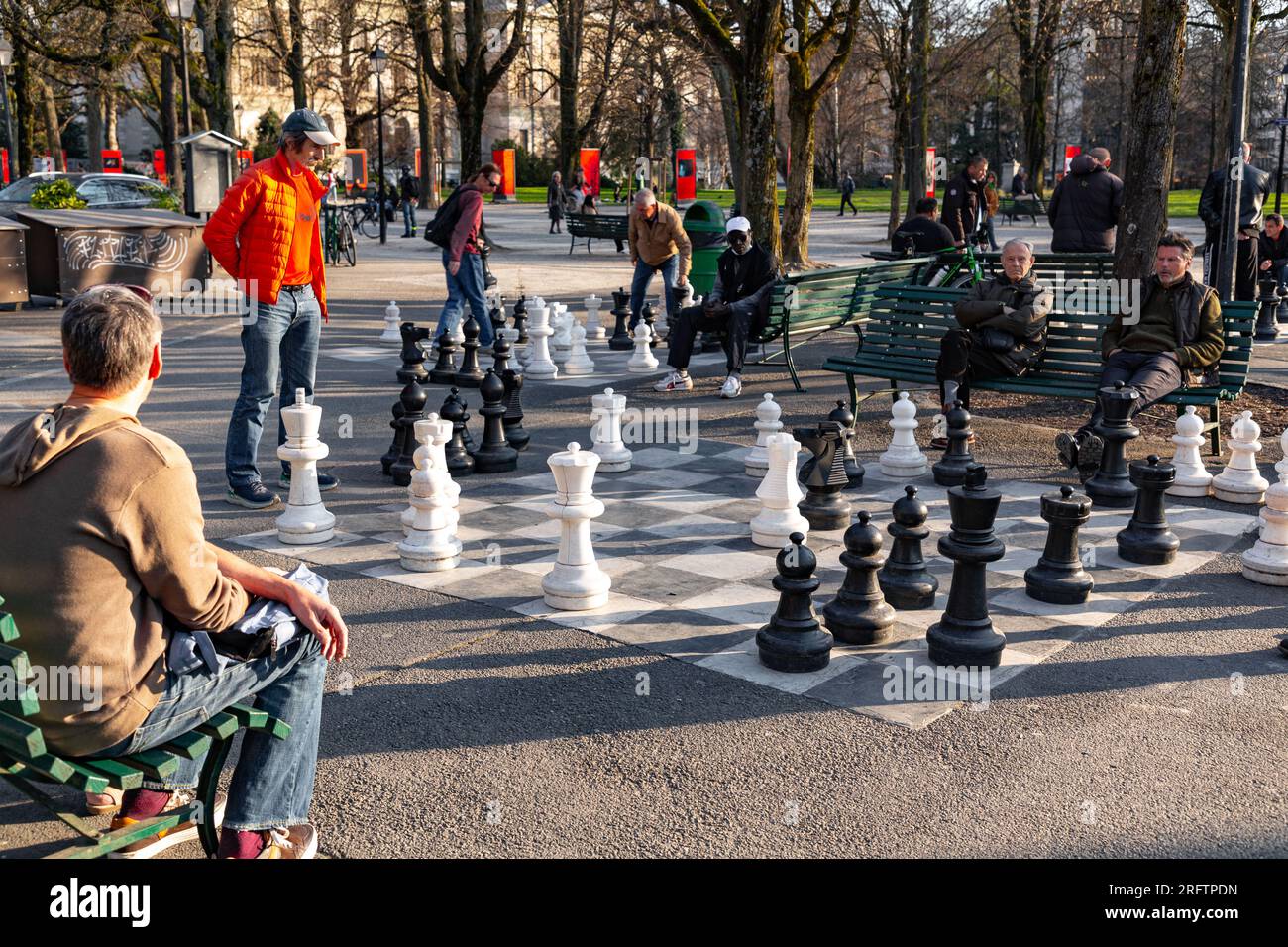Geneva, Switzerland - 24 March 2022: Group of people playing chess game ...