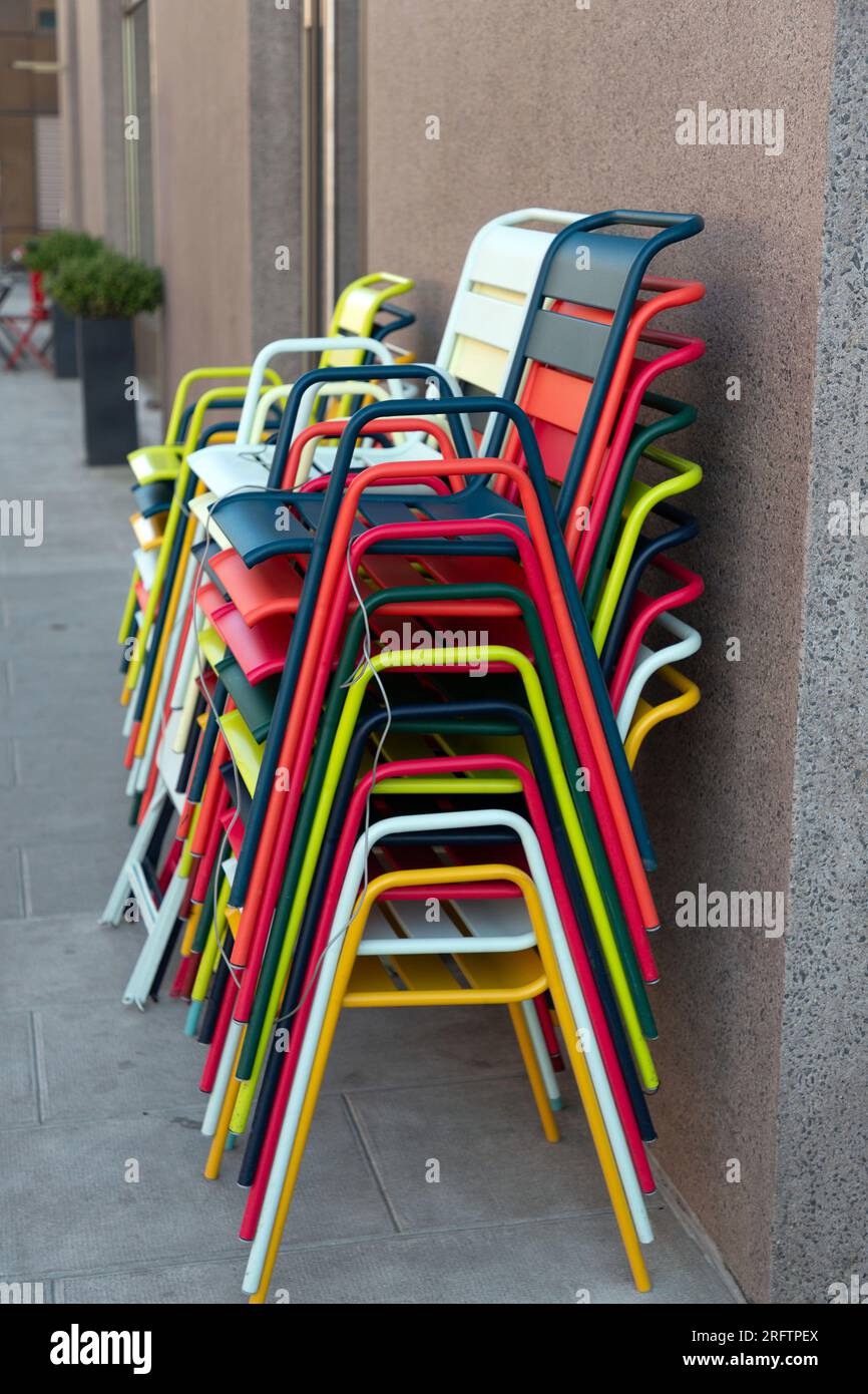 Modern chairs stacked hi-res stock photography and images - Alamy