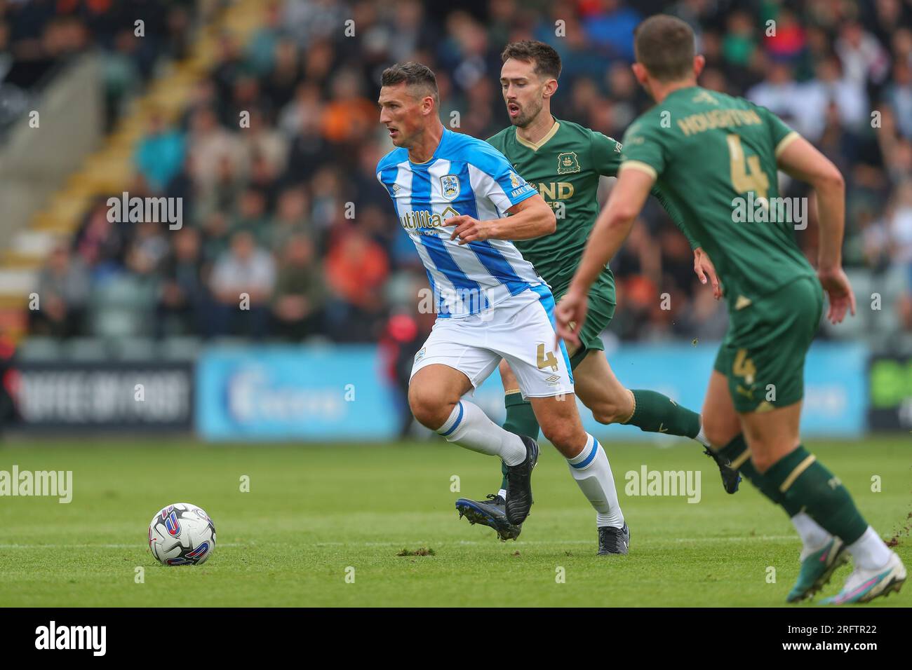Matty Pearson #4 of Huddersfield Town runs with the ball during the Sky ...