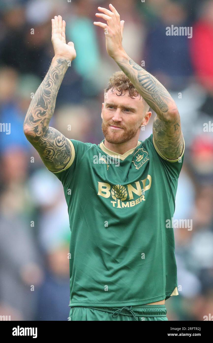 Dan Scarr #6 of Plymouth Argyle applauds the home fans during the Sky ...