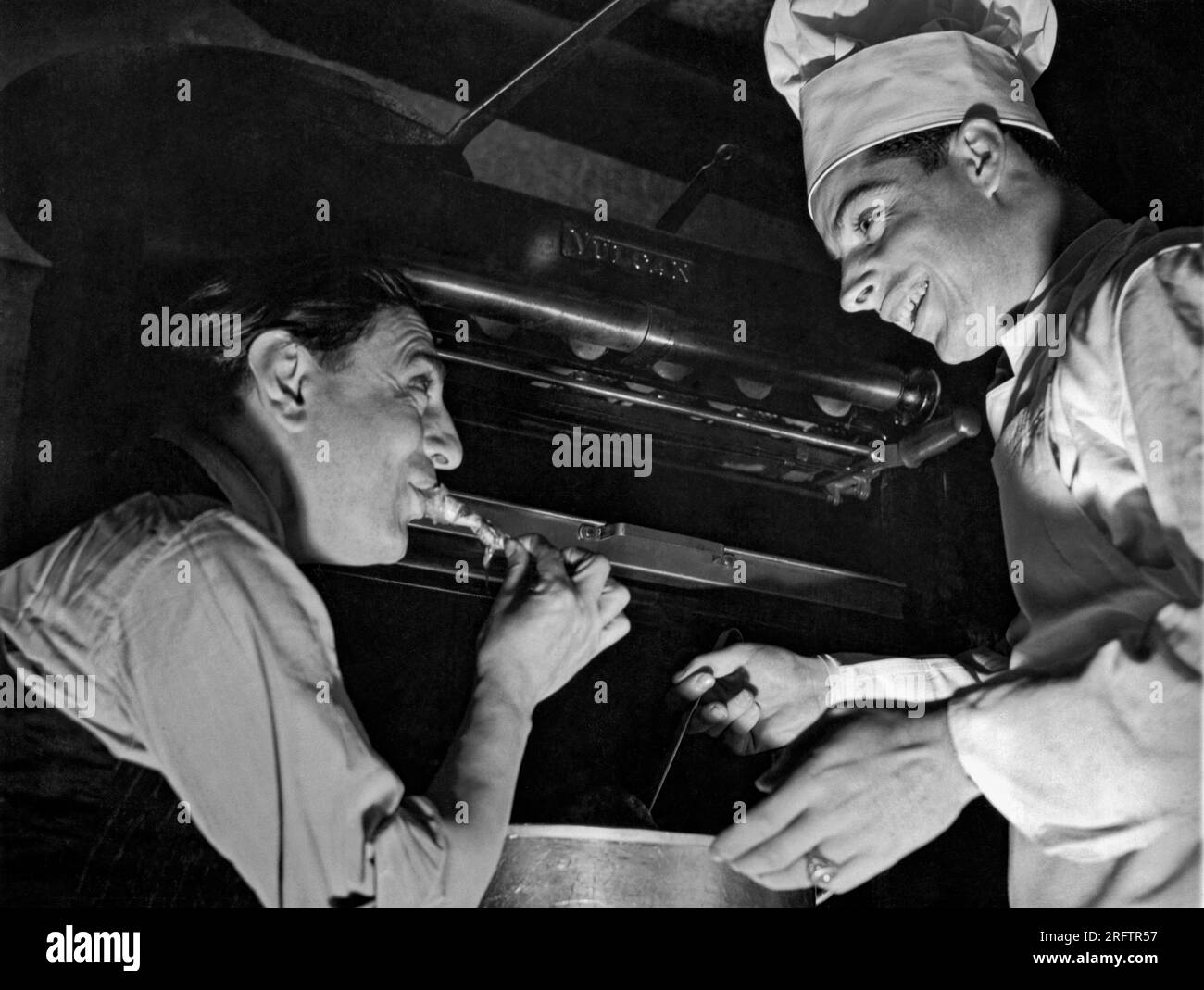 Celebrities eating spaghetti Black and White Stock Photos & Images - Alamy