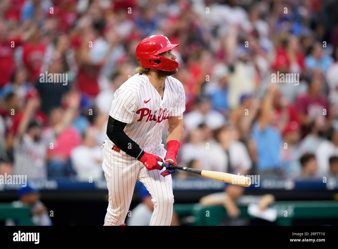 Philadelphia Phillies' Bryce Harper watches after hitting a two-run ...