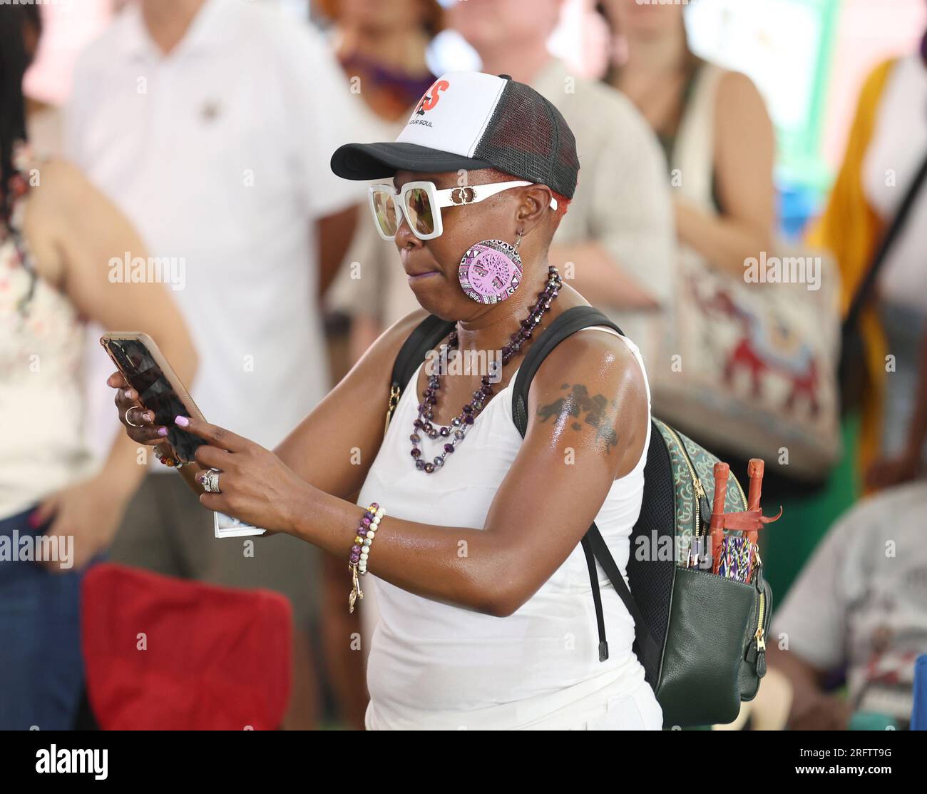 New Orleans, USA. 05th Aug, 2023. A woman take some cell phone photos ...