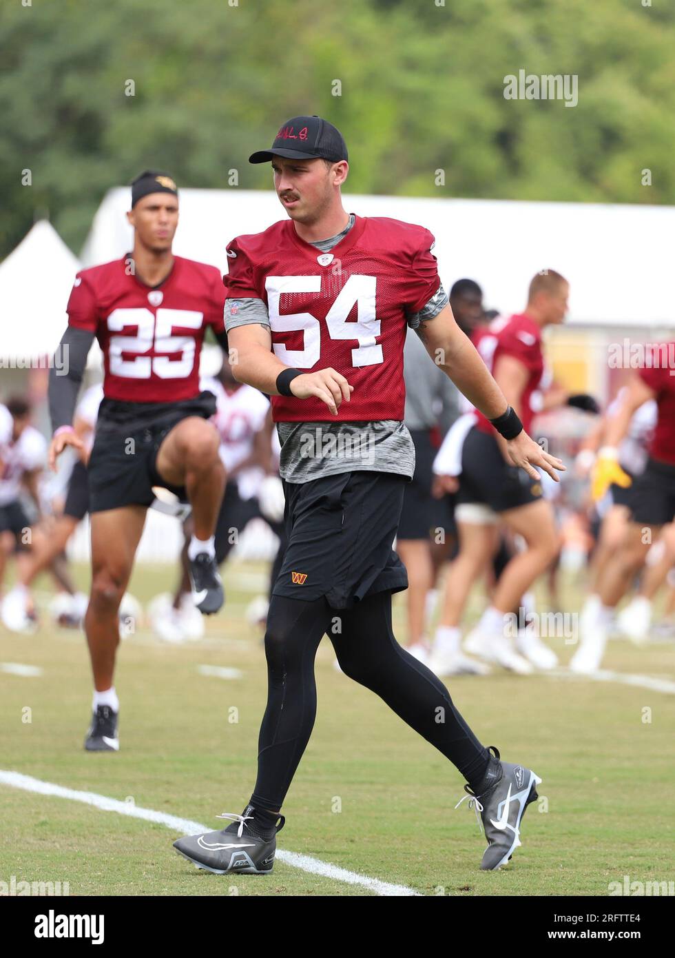 Washington Commanders LS Camaron Cheeseman (54) warming up before the ...