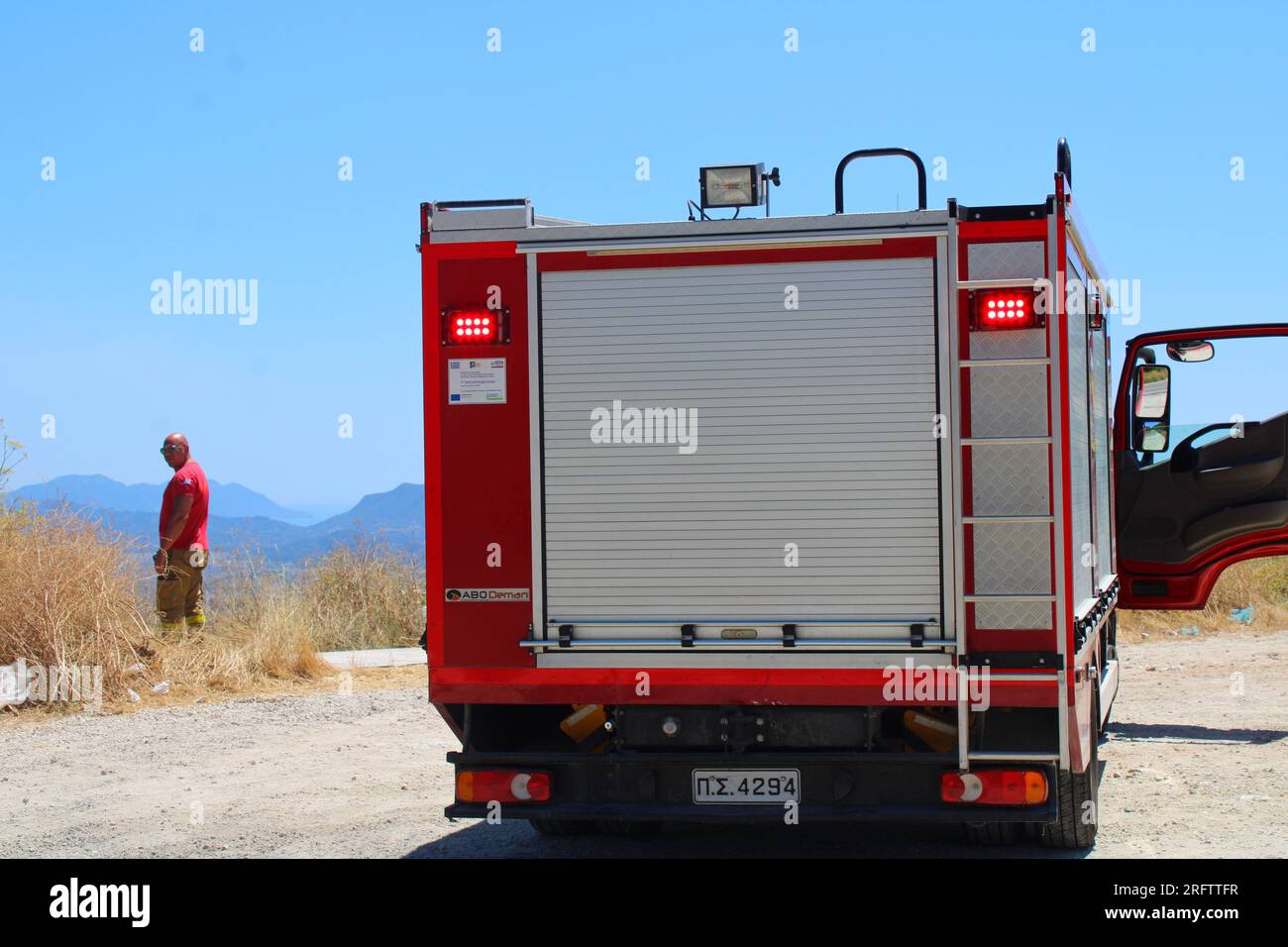 Greek Firefighter looking for new wildfires from mountain top in ...