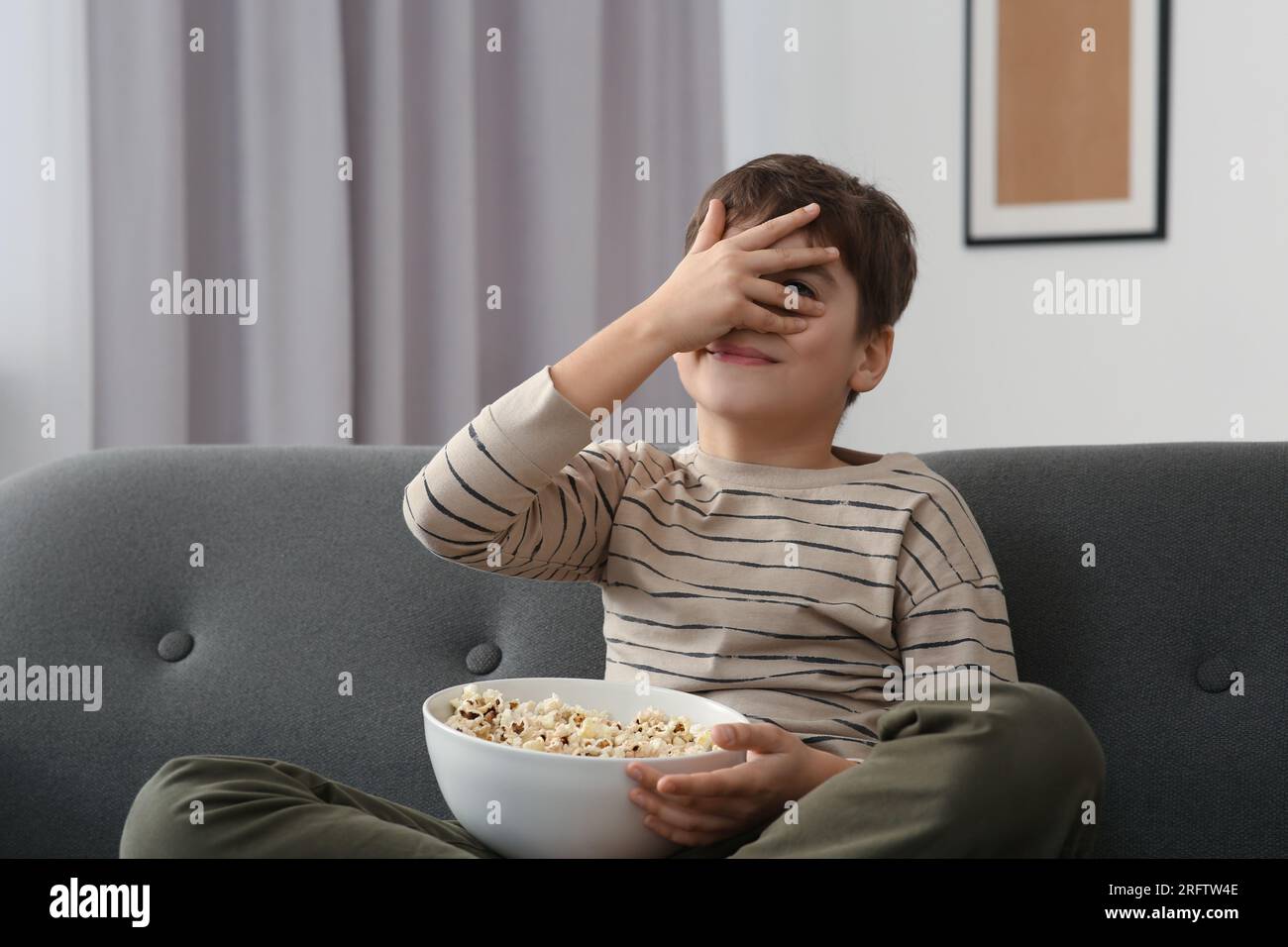 Child preteen eating popcorn hi-res stock photography and images - Alamy