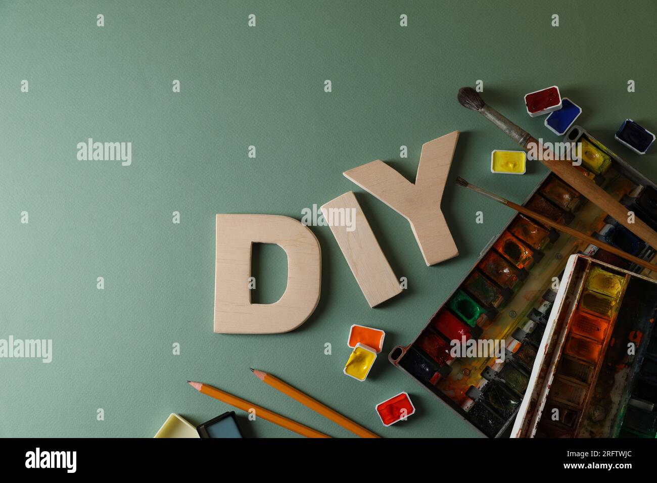 Abbreviation DIY made of letters and different painting supplies on ...