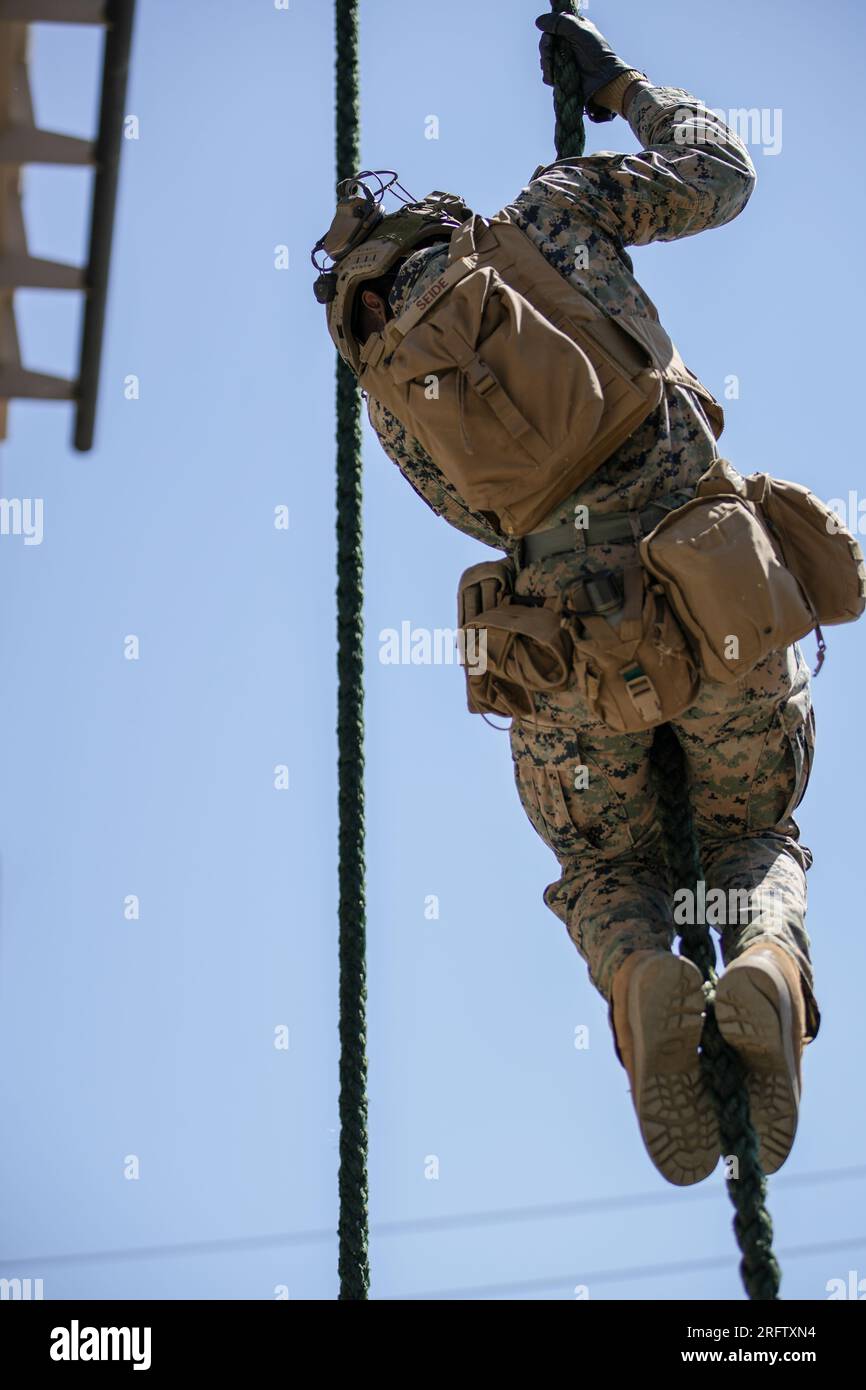 U.S. Marine Corps Lance Cpl. John Seide, a combat engineer assigned to ...