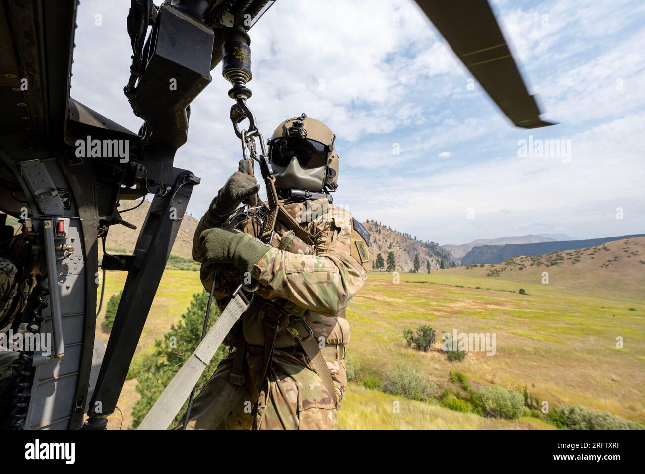 The Idaho Army National Guard’s State Aviation Group practice hoisting ...