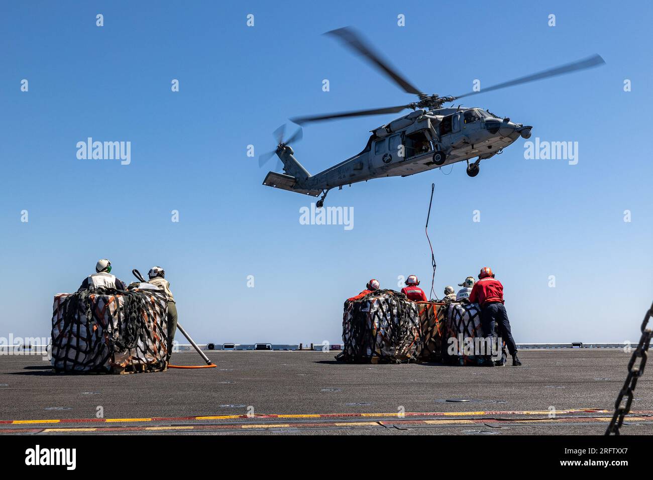 A U.S. Navy MH-60S Seahawk assigned to Helicopter Sea Combat Squadron ...