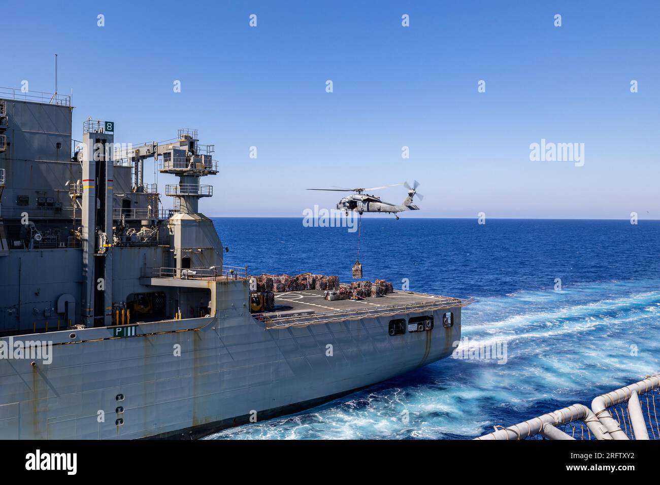 A U.S. Navy MH-60S Seahawk assigned to Helicopter Sea Combat Squadron ...