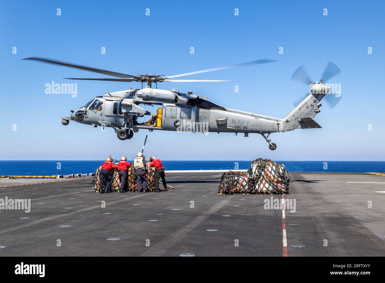 A U.S. Navy MH-60S Seahawk assigned to Helicopter Sea Combat Squadron ...