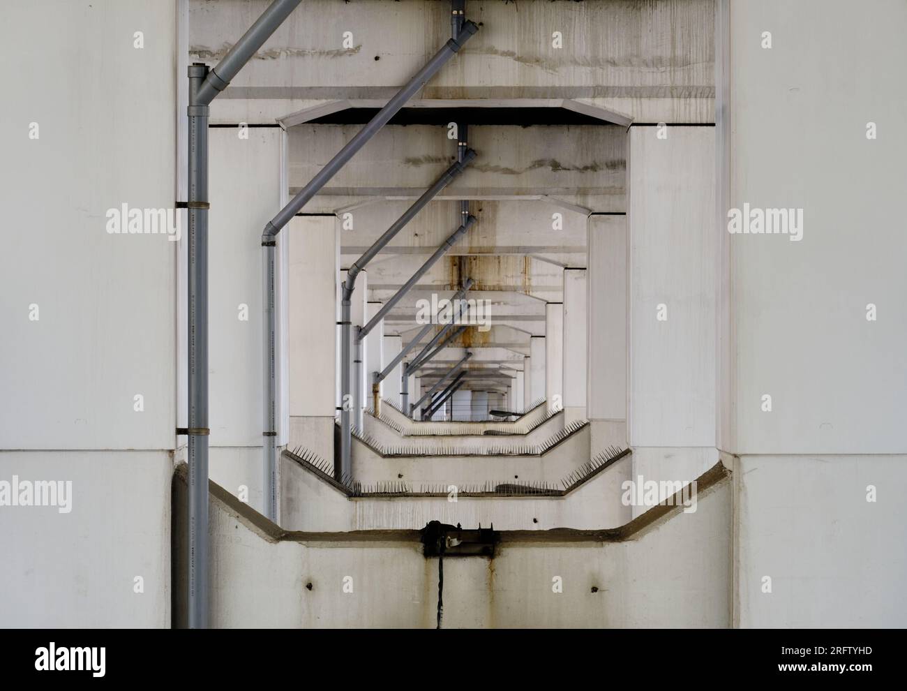 view of elevated highway under structure patterns of square opening ...