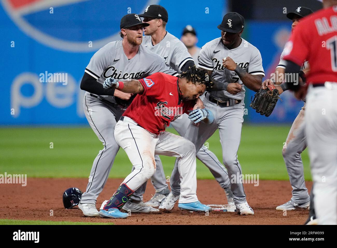 Chicago White Sox's Michael Kopech, left, holds Cleveland Guardians ...
