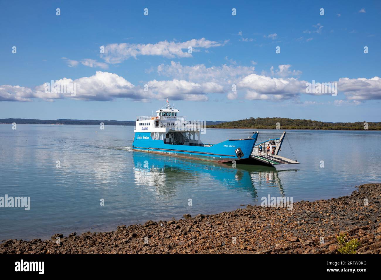 Fraser Island sealing ferry transporting people and vehicles from River ...