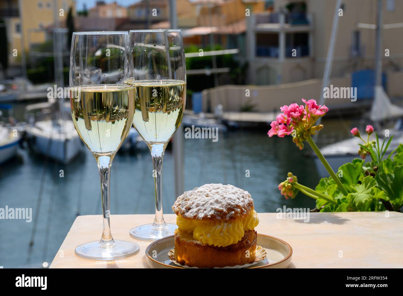 Drinking of French brut champagne sparkling wine with cake Tarte ...