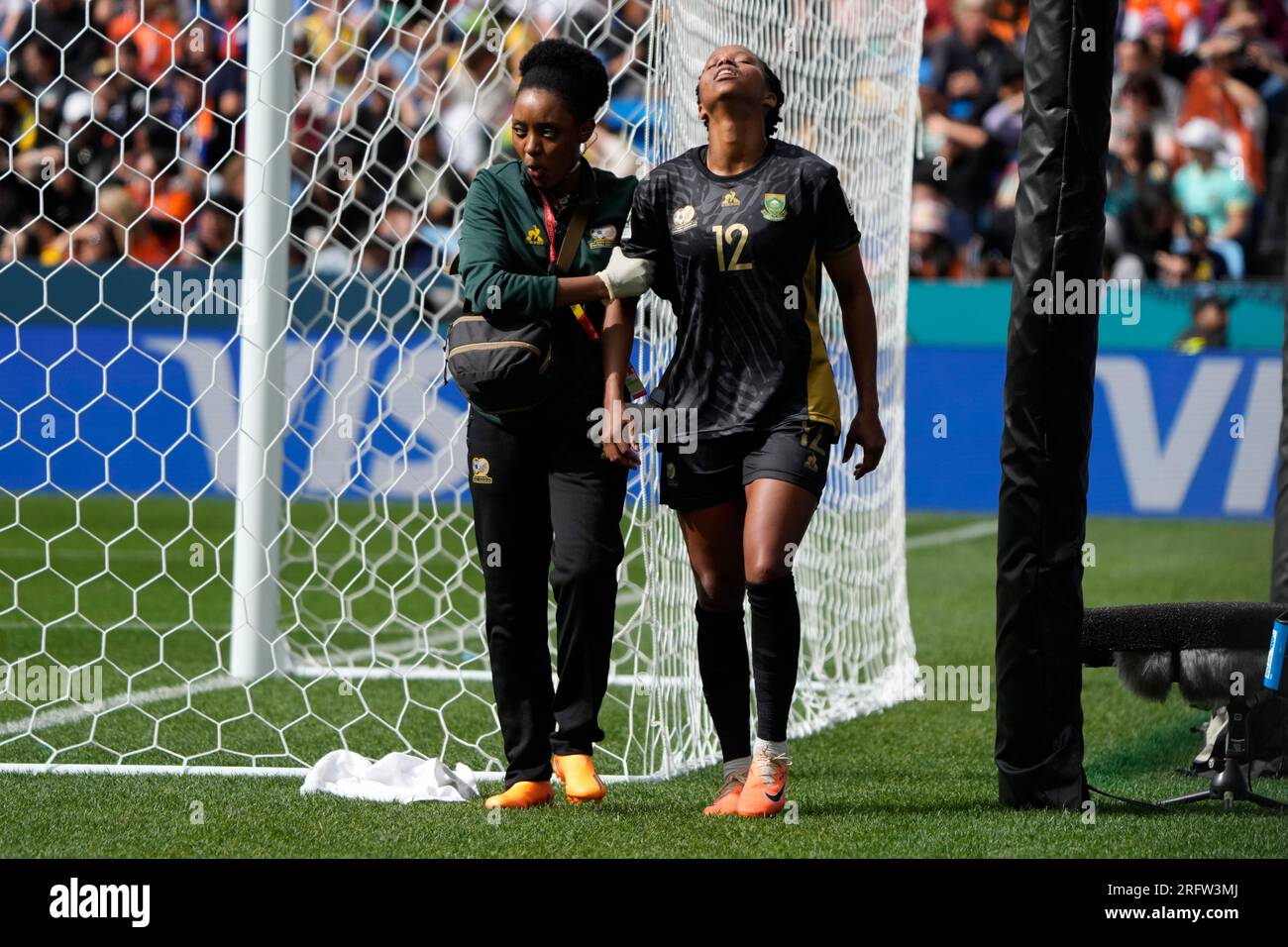South Africa's Jermaine Seoposenwe lives the pitch after being injured ...