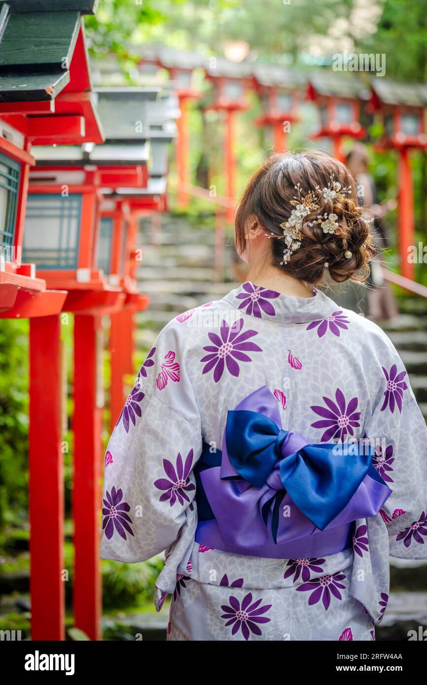 Back view of one woman wearing Japanese yukata summer kimono in Kifune ...