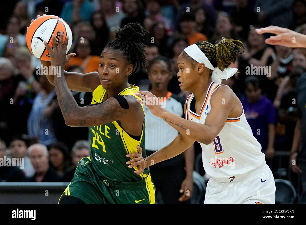 Seattle Storm guard Jewell Loyd (24) drives past Phoenix Mercury guard ...
