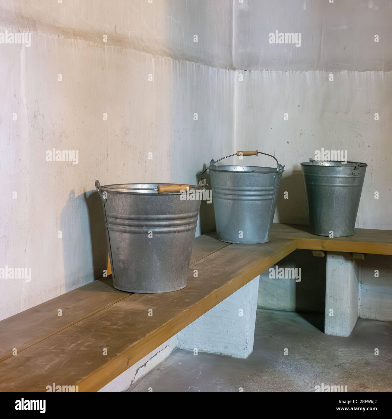Metal buckets on bench in the washing room of Sauna of Amuri museum of ...