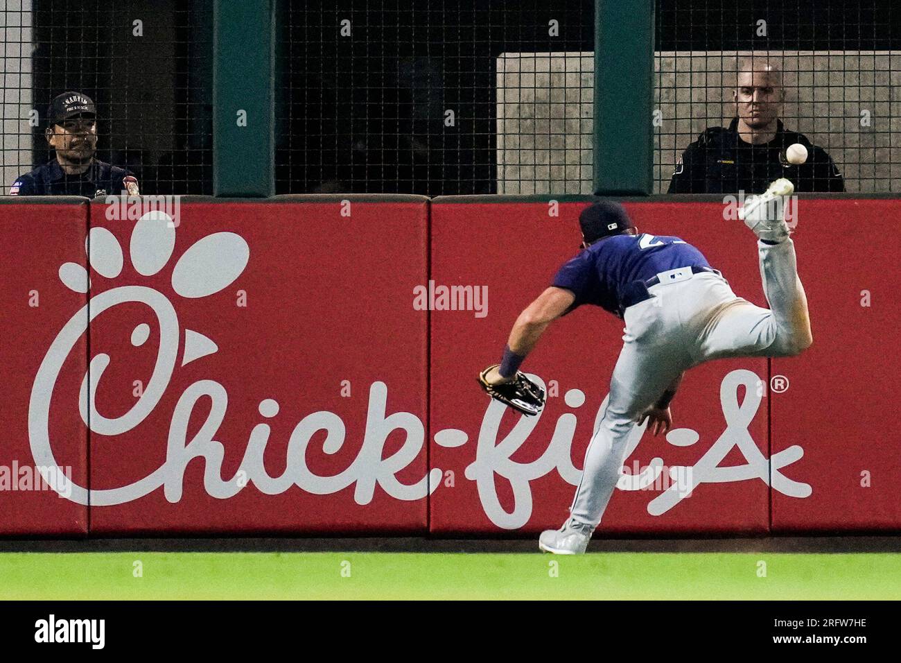 Seattle Mariners left fielder Dylan Moore (25) does not catch a line ...