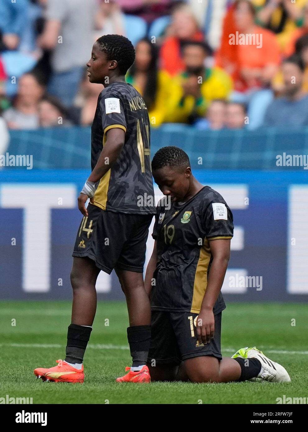 South Africa's Tiisetso Makhubela, left, and Kholosa Biyana react after ...