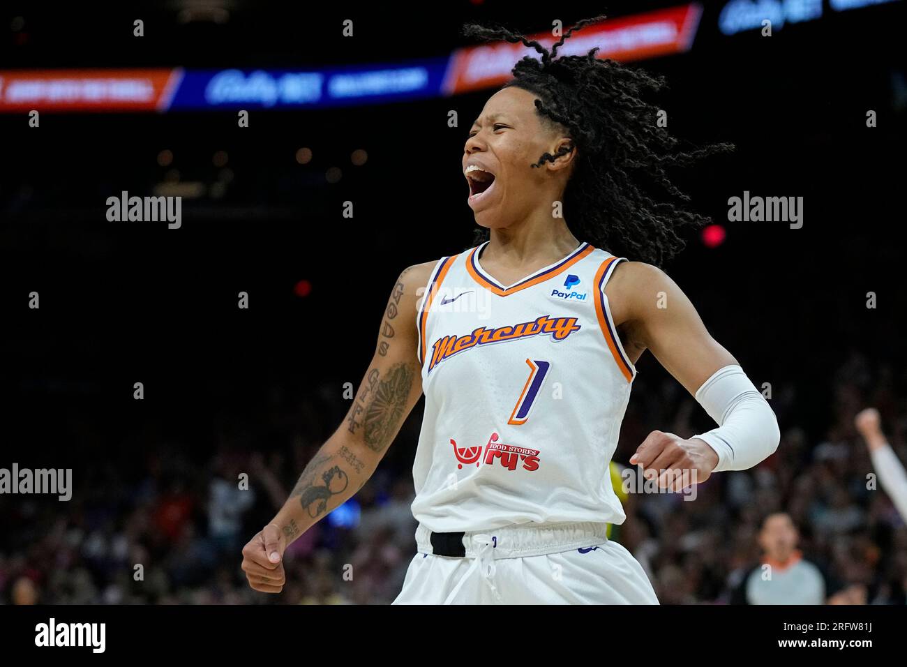 Phoenix Mercury guard Sug Sutton celebrates her score after being ...
