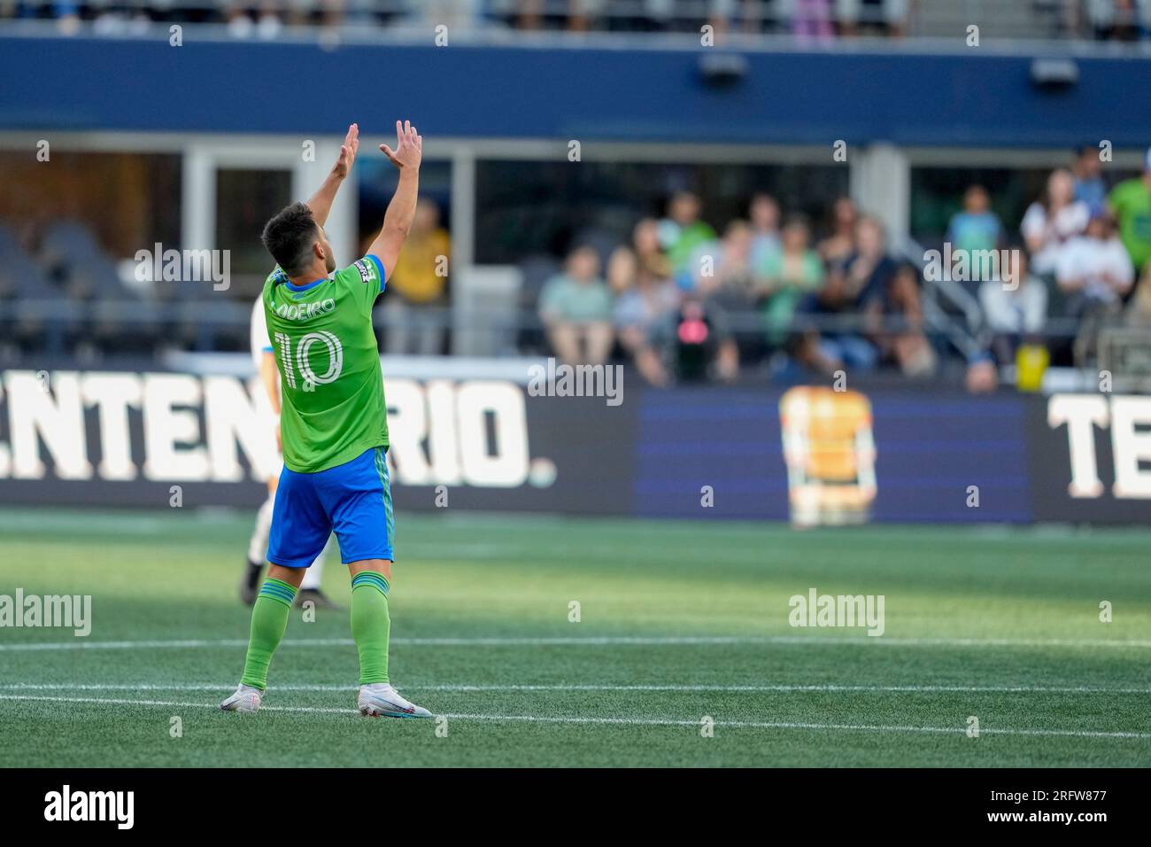 Seattle Sounders midfielder Nicolás Lodeiro (10) makes a heart after ...