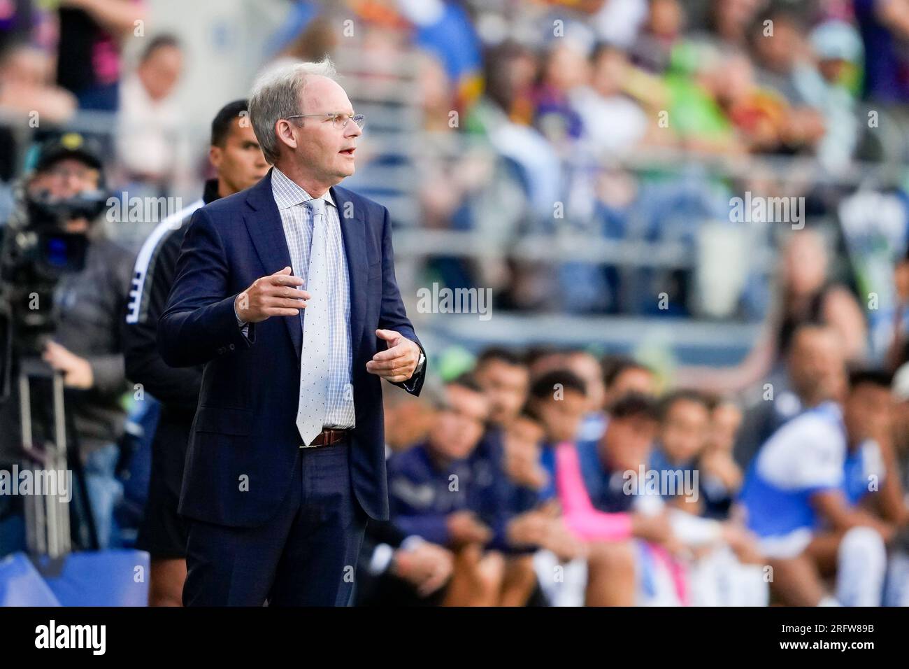 Seattle Sounders head coach Brian Schmetzer watches from the sideline ...