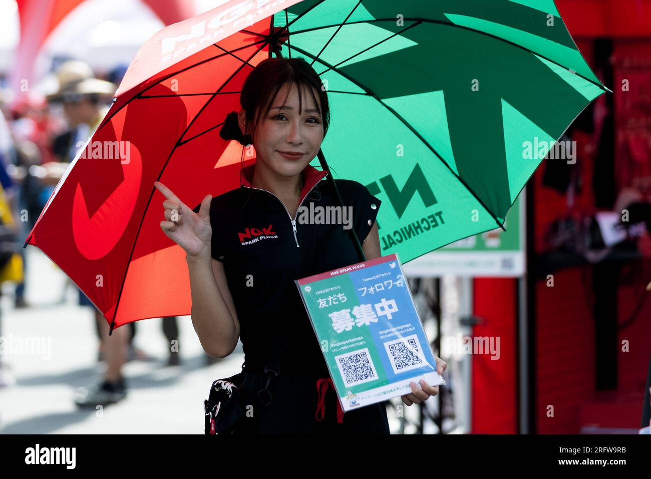 Suzuka, JAPAN, 6 August, 2023. NGK promo girl during The 44th Coca-Cola Suzuka 8hr Endurance ...