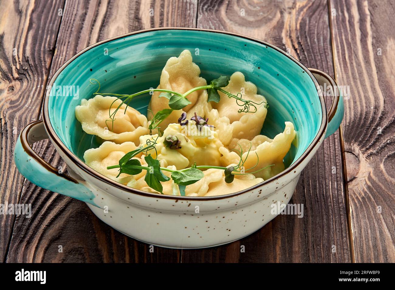 delicious dumplings in a deep dish Stock Photo - Alamy