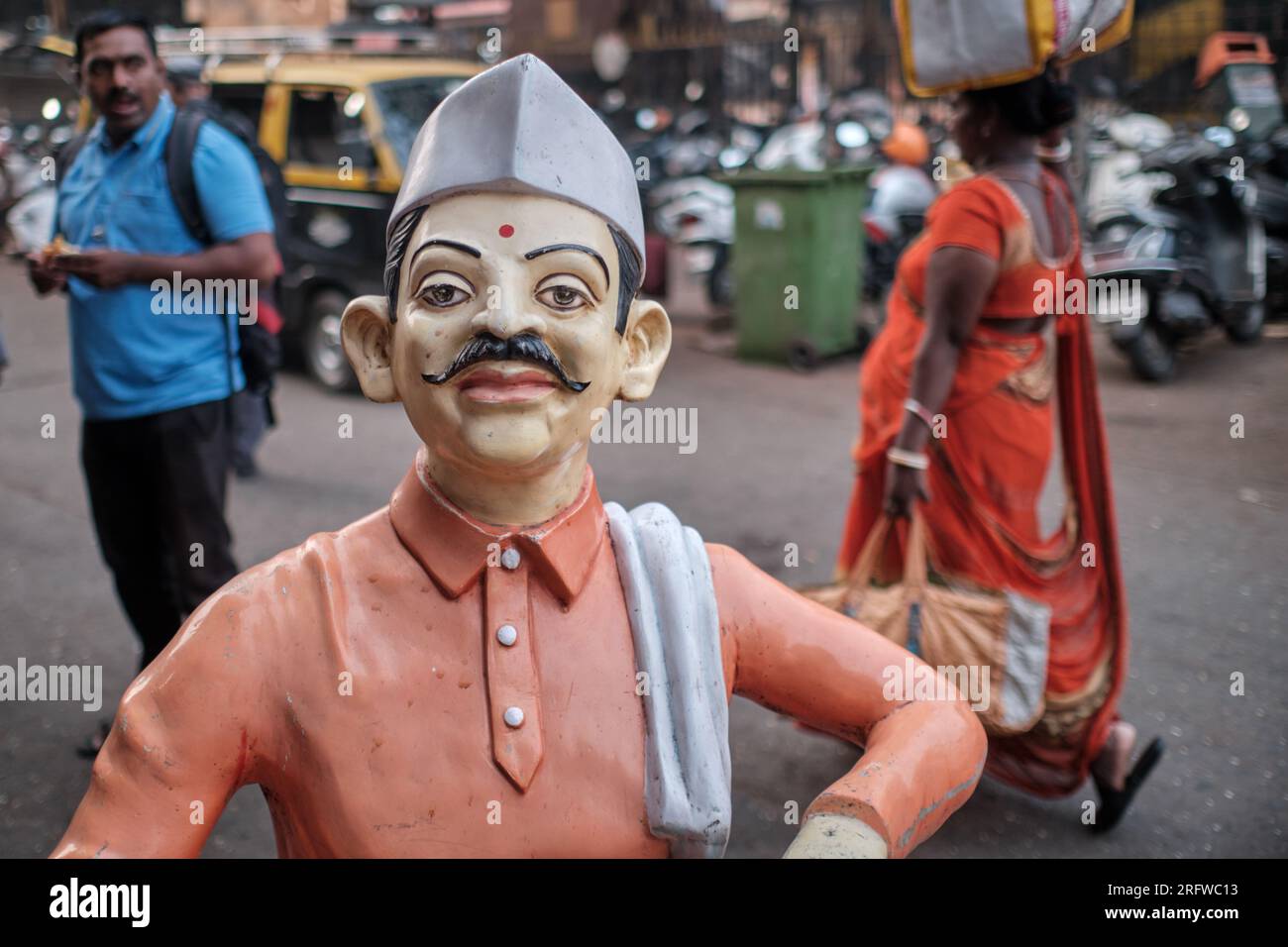 The trademark figure of an Indian teashop chain, depicting a tea boy or ...
