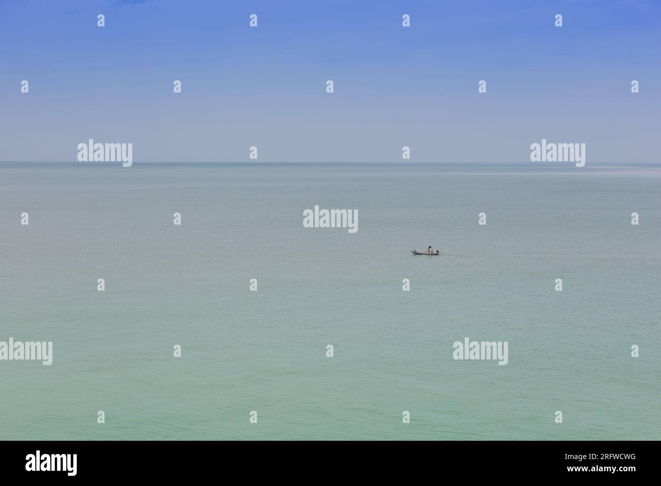 A boat in the middle of the sea Stock Photo - Alamy