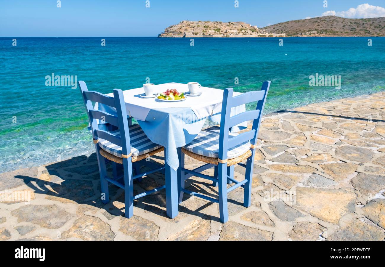 Crete Greece Plaka Lassithi, a traditional blue table and chairs on the ...