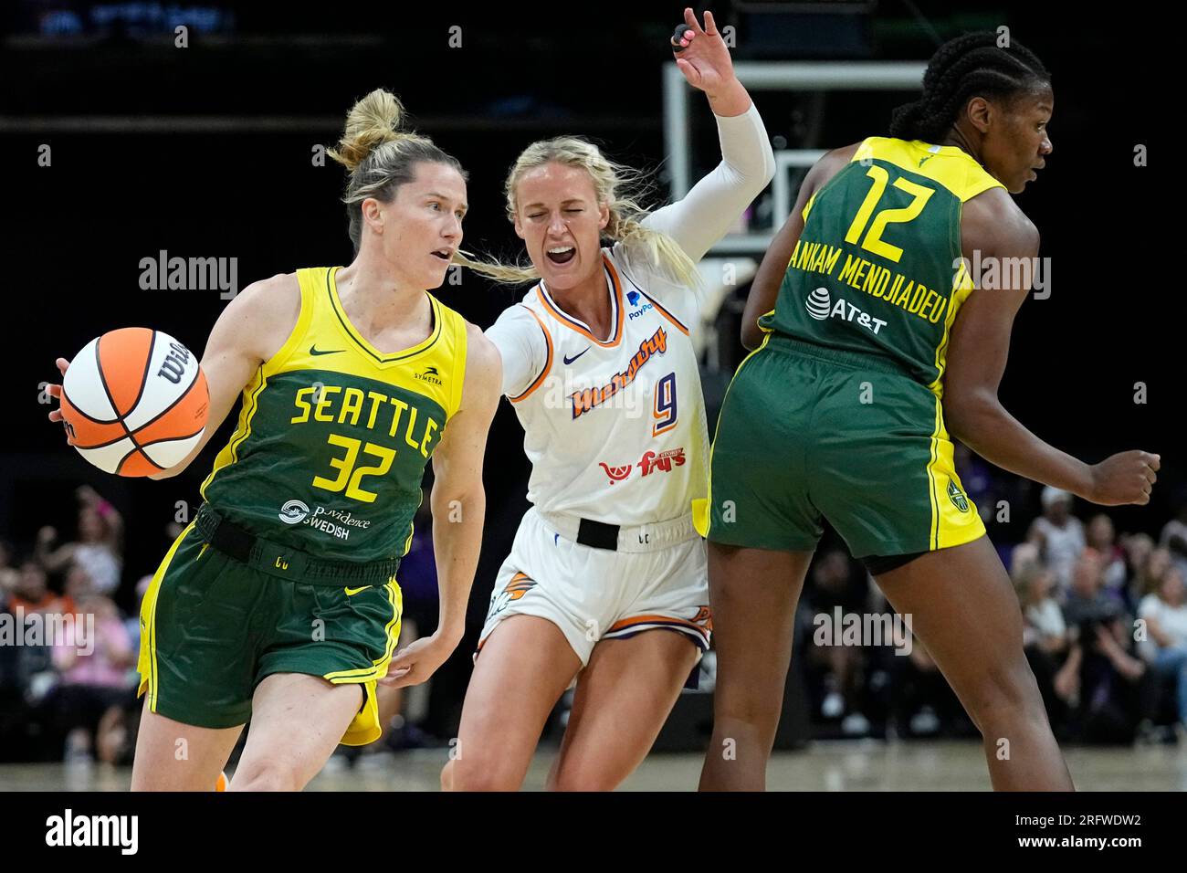 Seattle Storm guard Sami Whitcomb (32) dribbles the ball as Storm ...
