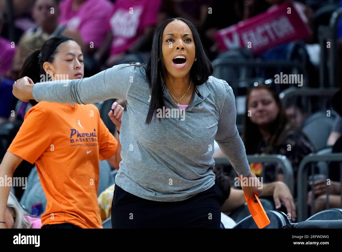 Phoenix Mercury interim head coach Nikki Blue shouts intructions to her ...