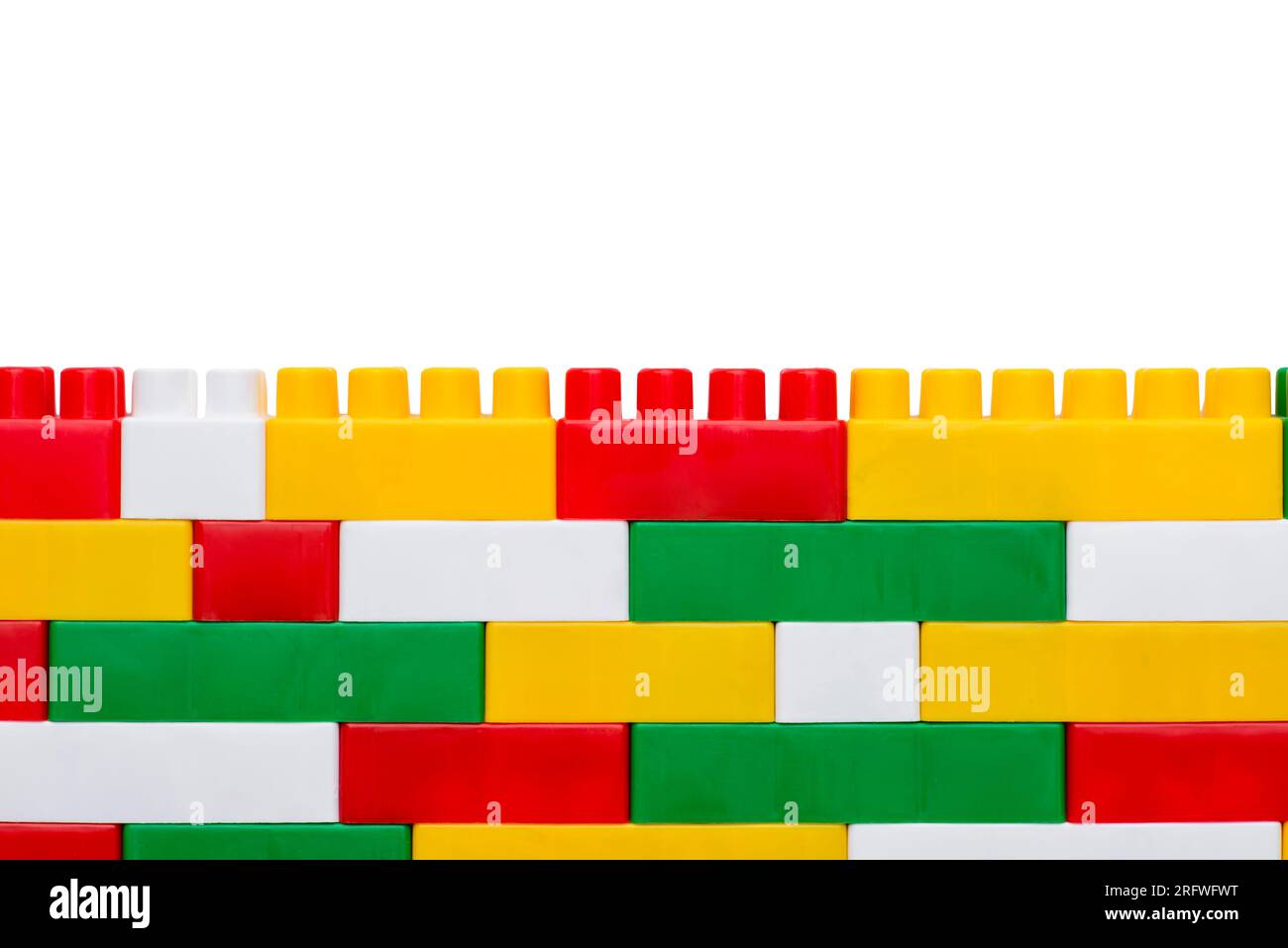 Wall from plastic blocks. Plastic building blocks isolated on white ...