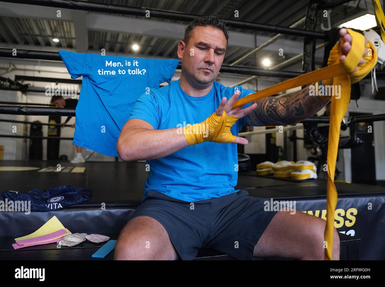 Dave Thompson wraps his hands before a training session at Bells Gym in ...