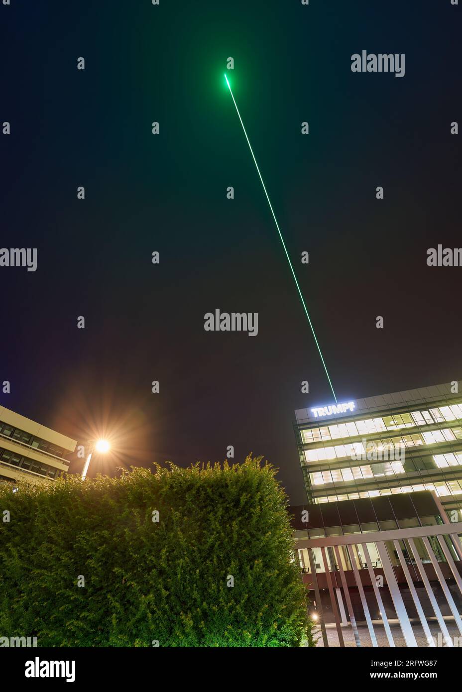 Ditzingen, Germany - August 05, 2023: Laser beam in green. Trumpf Tool ...