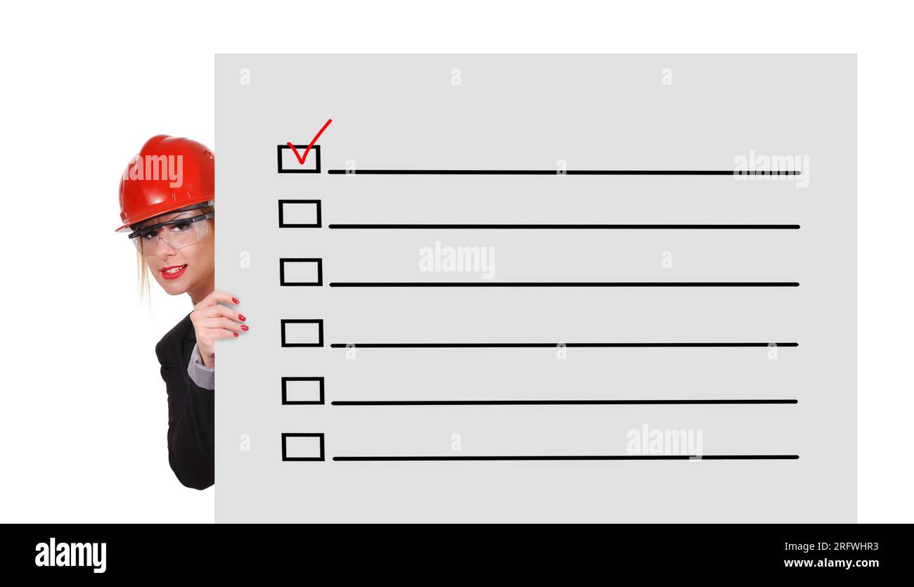 Engineer woman holding poster with check box Stock Photo - Alamy