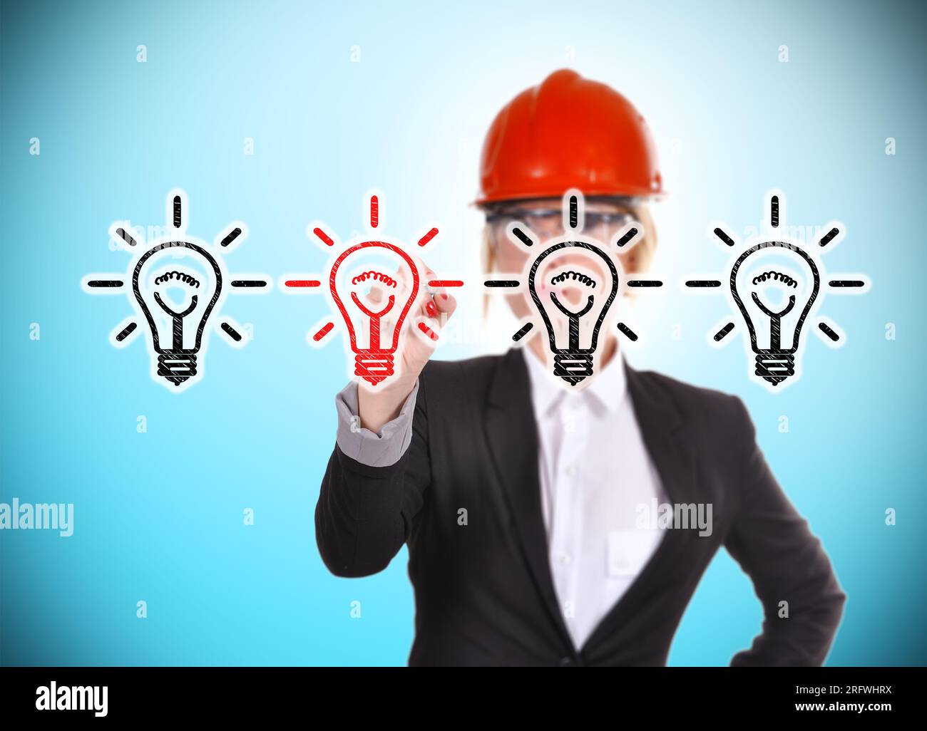 Woman and lightbulb hi-res stock photography and images - Alamy