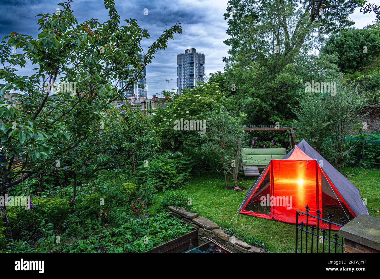Red tent on a lawn in backyard garden , London , United Kingdom Stock ...