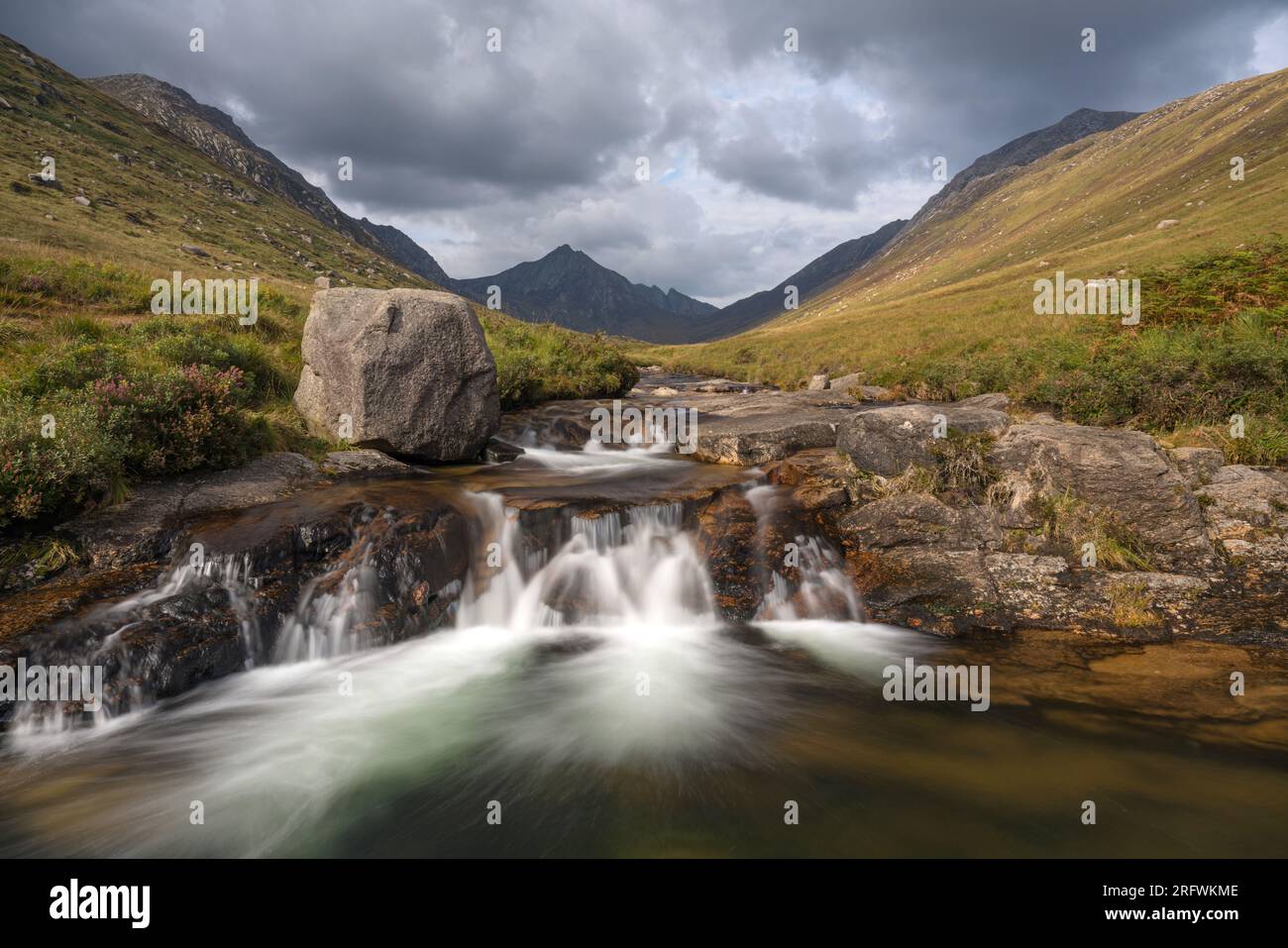 Glen Rosa waterfalls with the peak of Cir Mhor in the distance, Isle of ...