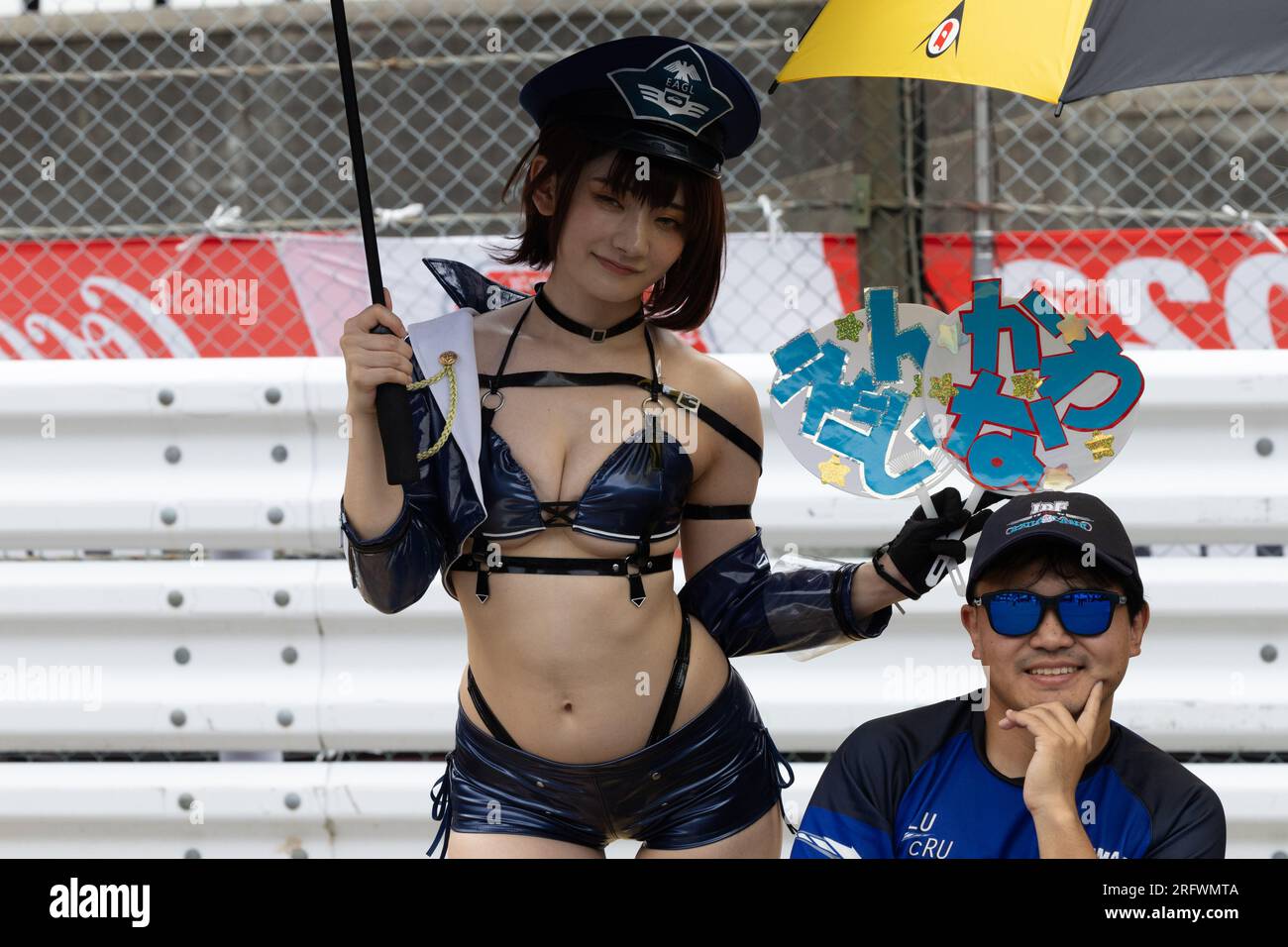 Suzuka, Japan, 6 August, 2023. Grid girl during The 44th Coca-Cola Suzuka 8hr Endurance Race ...