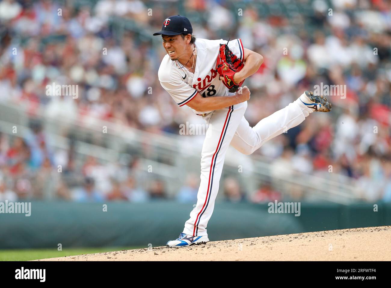 Minnesota Twins starting pitcher Kenta Maeda (18) throws a pitch in the ...
